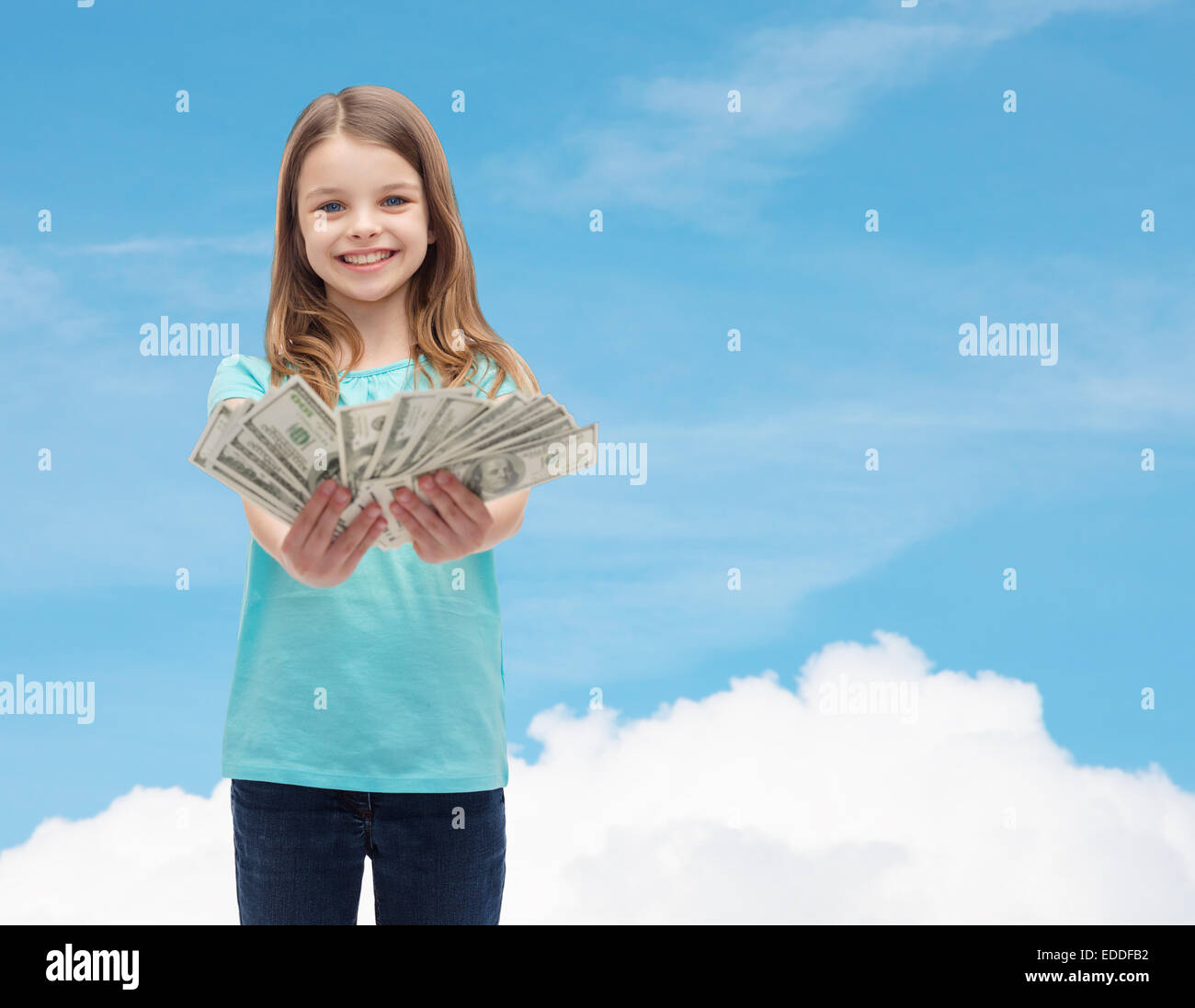smiling little girl giving dollar cash money Stock Photo - Alamy