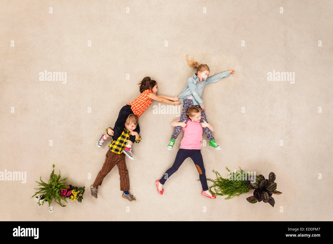 Kids playing carefree in park Stock Photo - Alamy
