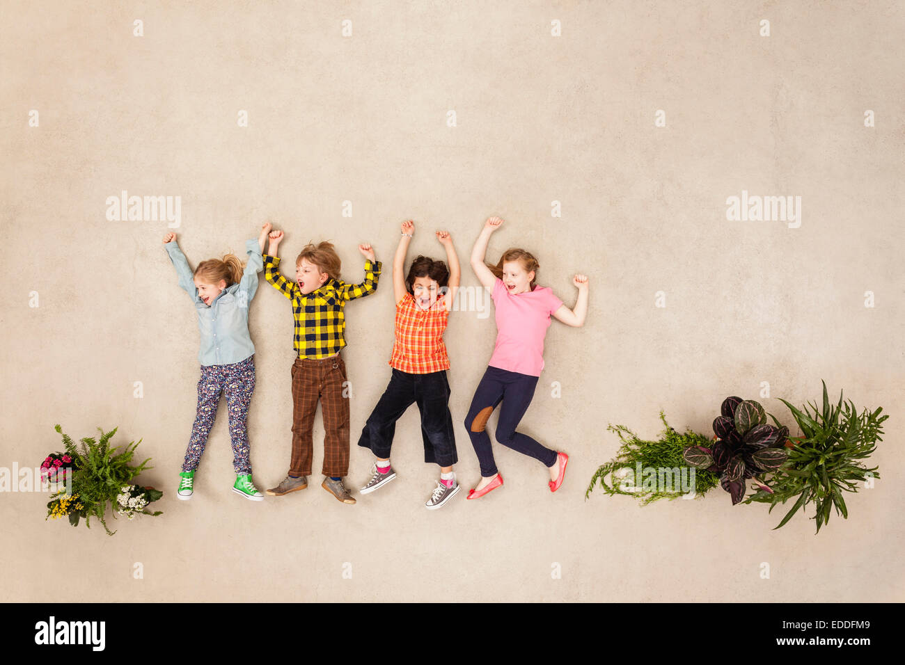 Kids playing carefree in park Stock Photo - Alamy