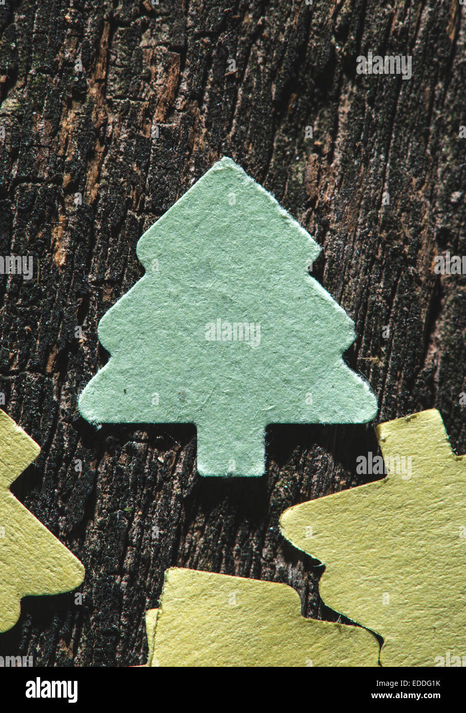 Coloured paper shaped like fir tree on dark wood Stock Photo - Alamy