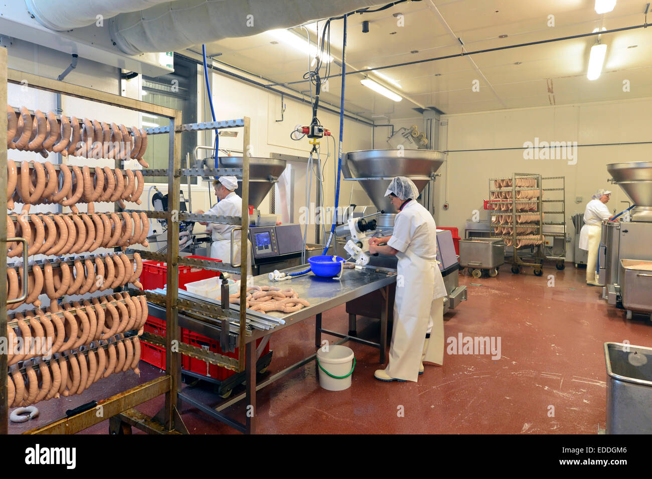 Women working at sausage production in a butchery Stock Photo - Alamy