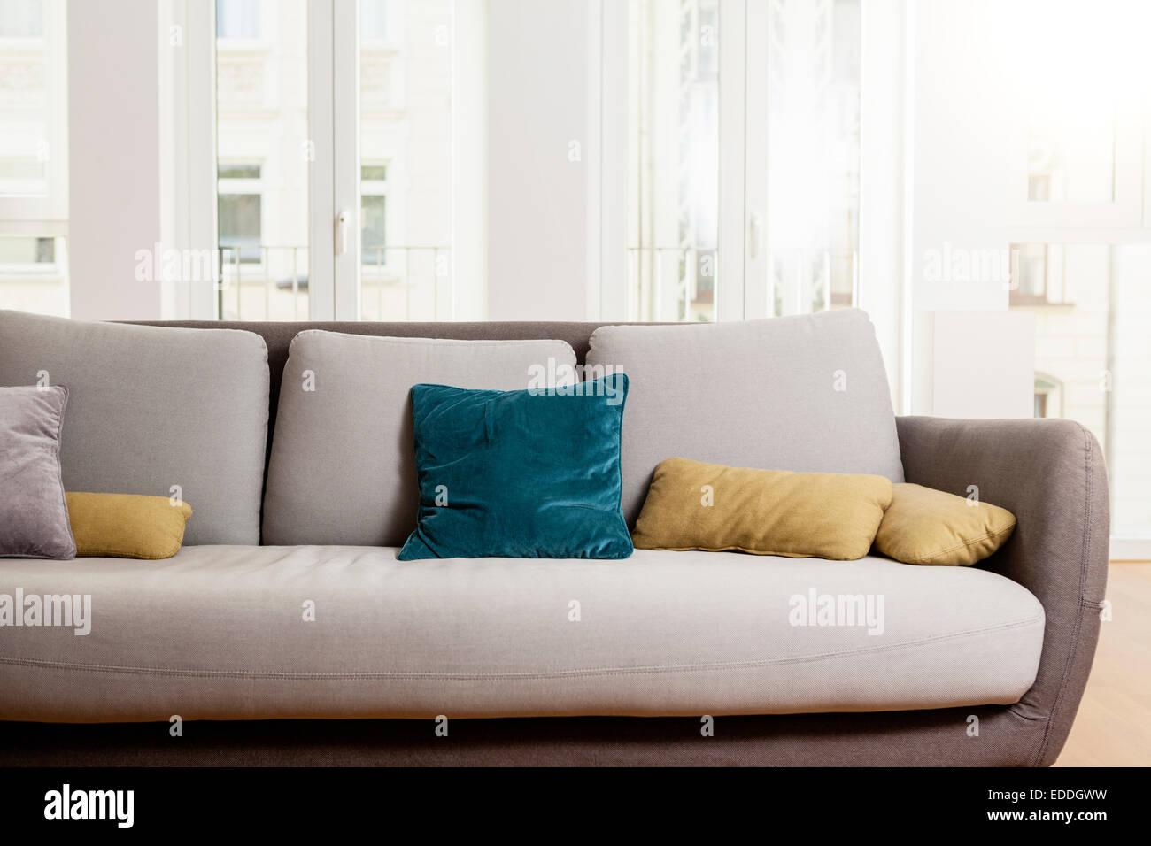 Couch in living room Stock Photo - Alamy