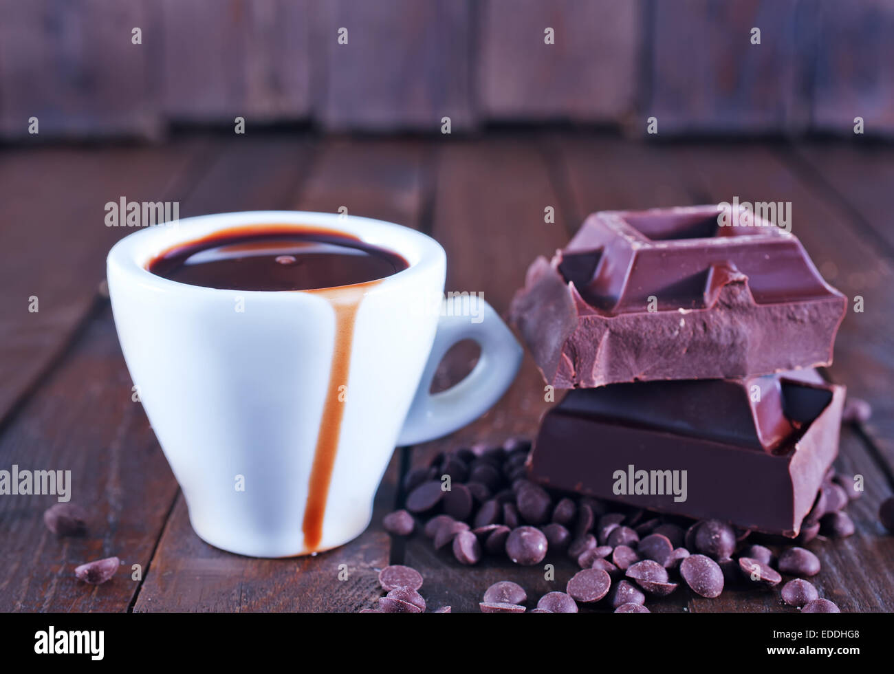hot chocolate in cup and on the wooden table Stock Photo - Alamy