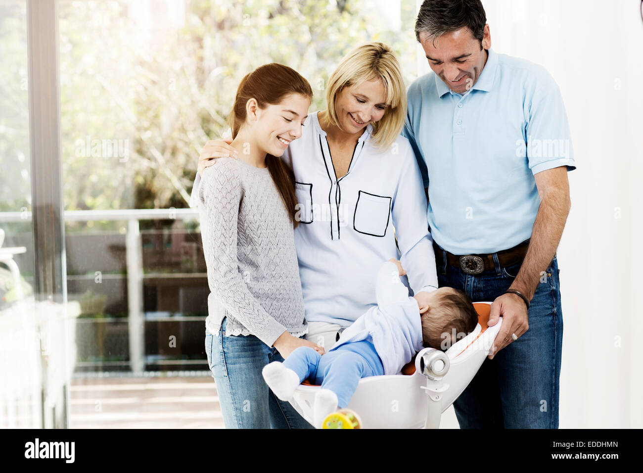 Parents looking after children hi-res stock photography and images - Alamy