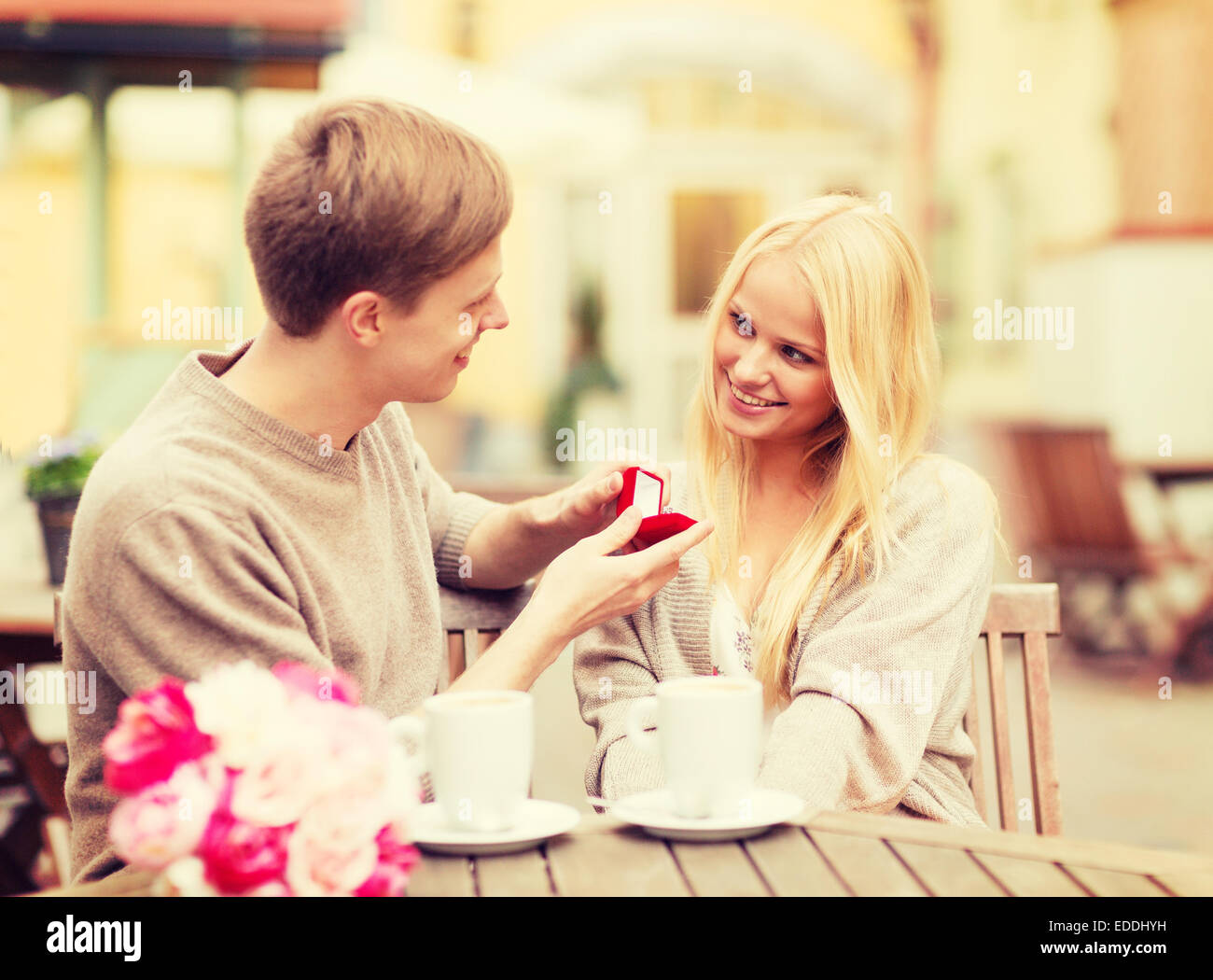 romantic man proposing to beautiful woman Stock Photo - Alamy