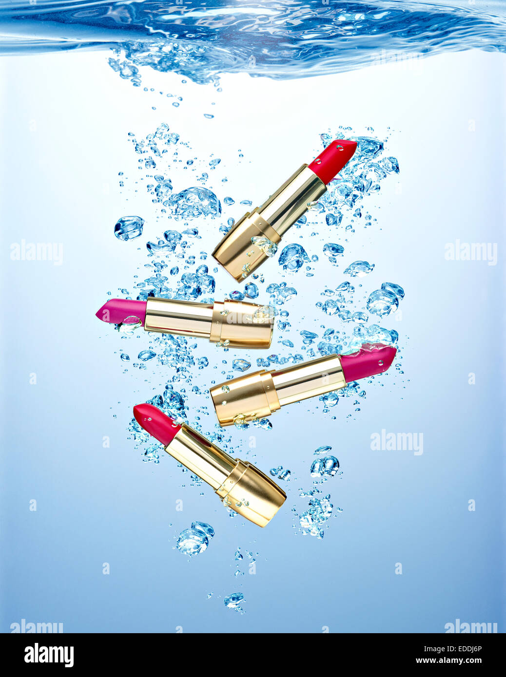 Four waterproofed lipsticks under water Stock Photo - Alamy