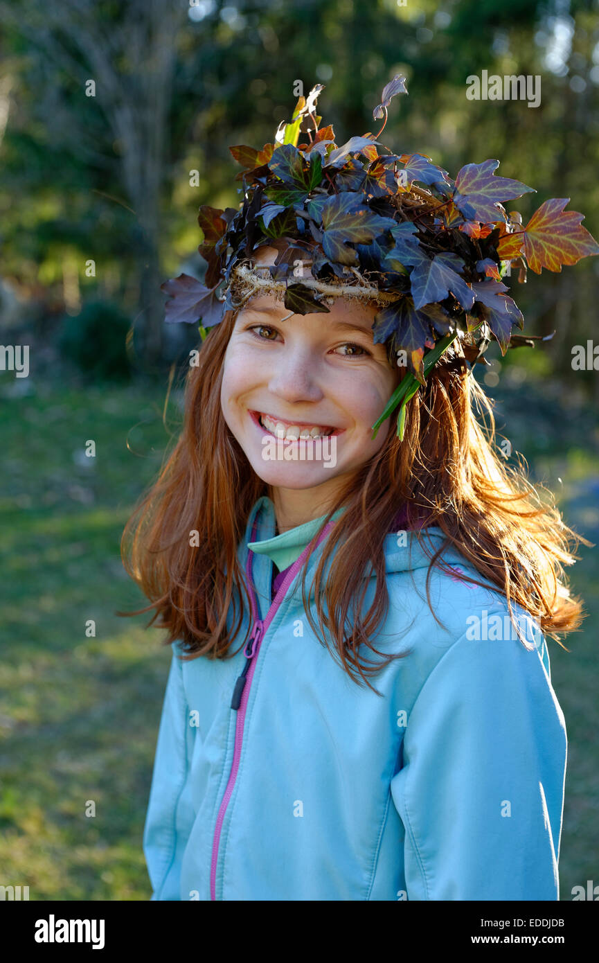 Portrait of happy girl with crown of autumn foliage on her head Stock ...