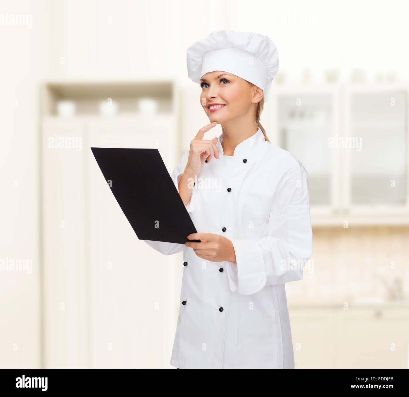 smiling female chef with black blank paper Stock Photo - Alamy