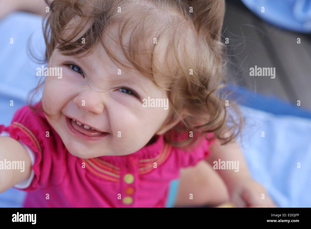 Portrait of smiling baby girl Stock Photo - Alamy