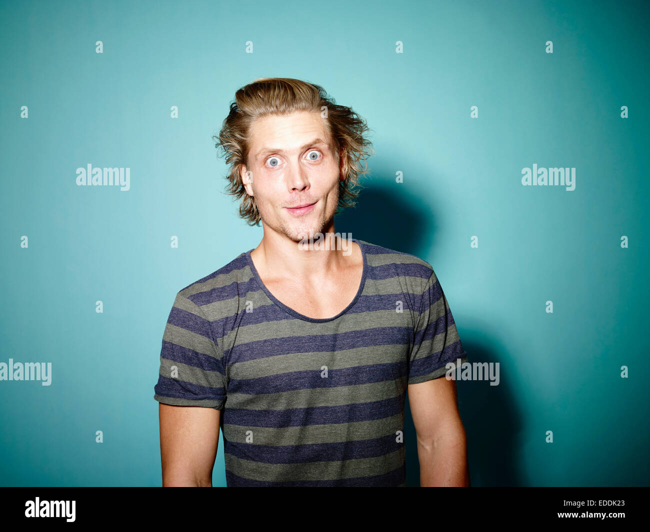 Portrait of man wide-eyed young man Stock Photo - Alamy