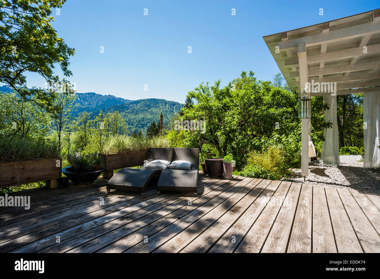 Wooden terrace in sunlight Stock Photo - Alamy