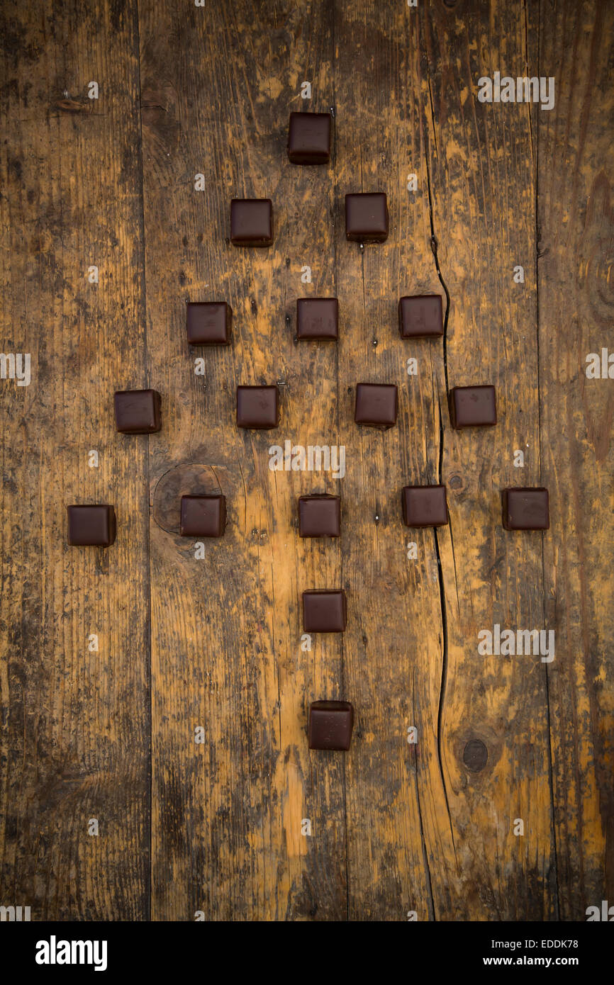 Dominos building a fir tree on wood Stock Photo - Alamy