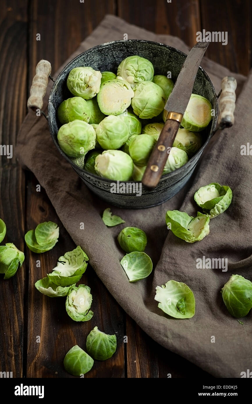 Peeled brussel sprouts in tin bucket, knife, studio Stock Photo - Alamy