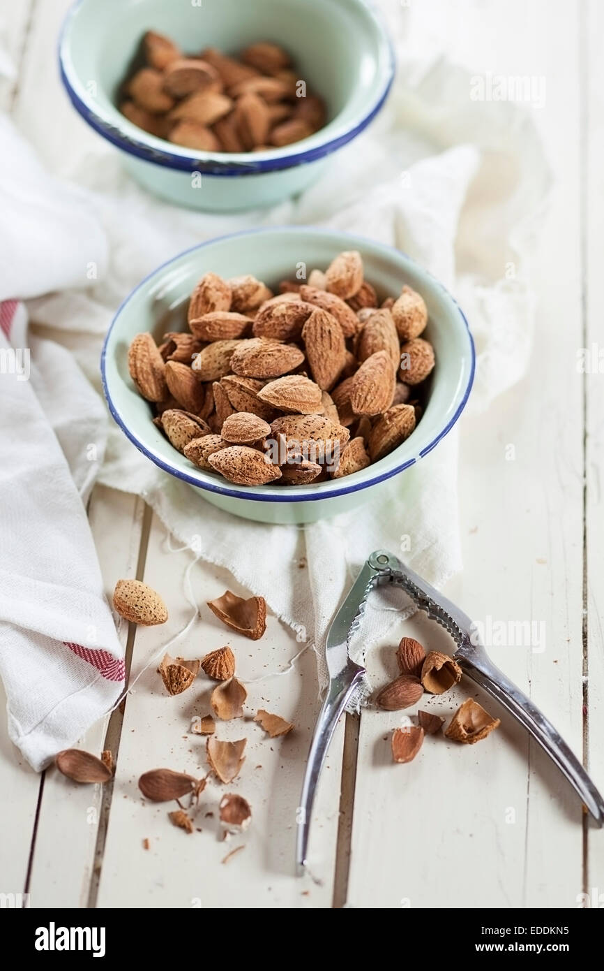 Roasted and salted almonds in shells, studio Stock Photo - Alamy