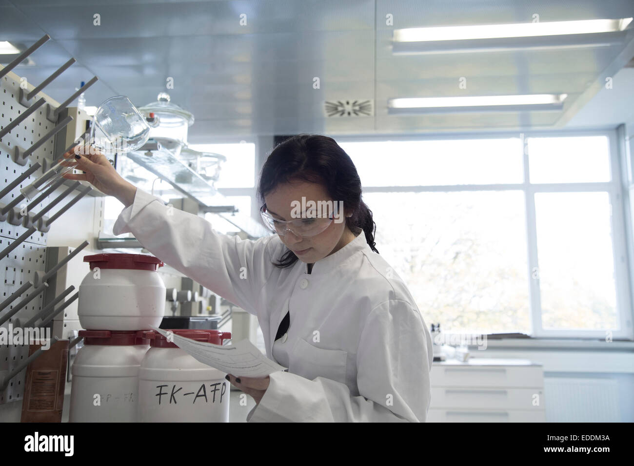 Young female scientist working in a biochemistry labroratory Stock ...