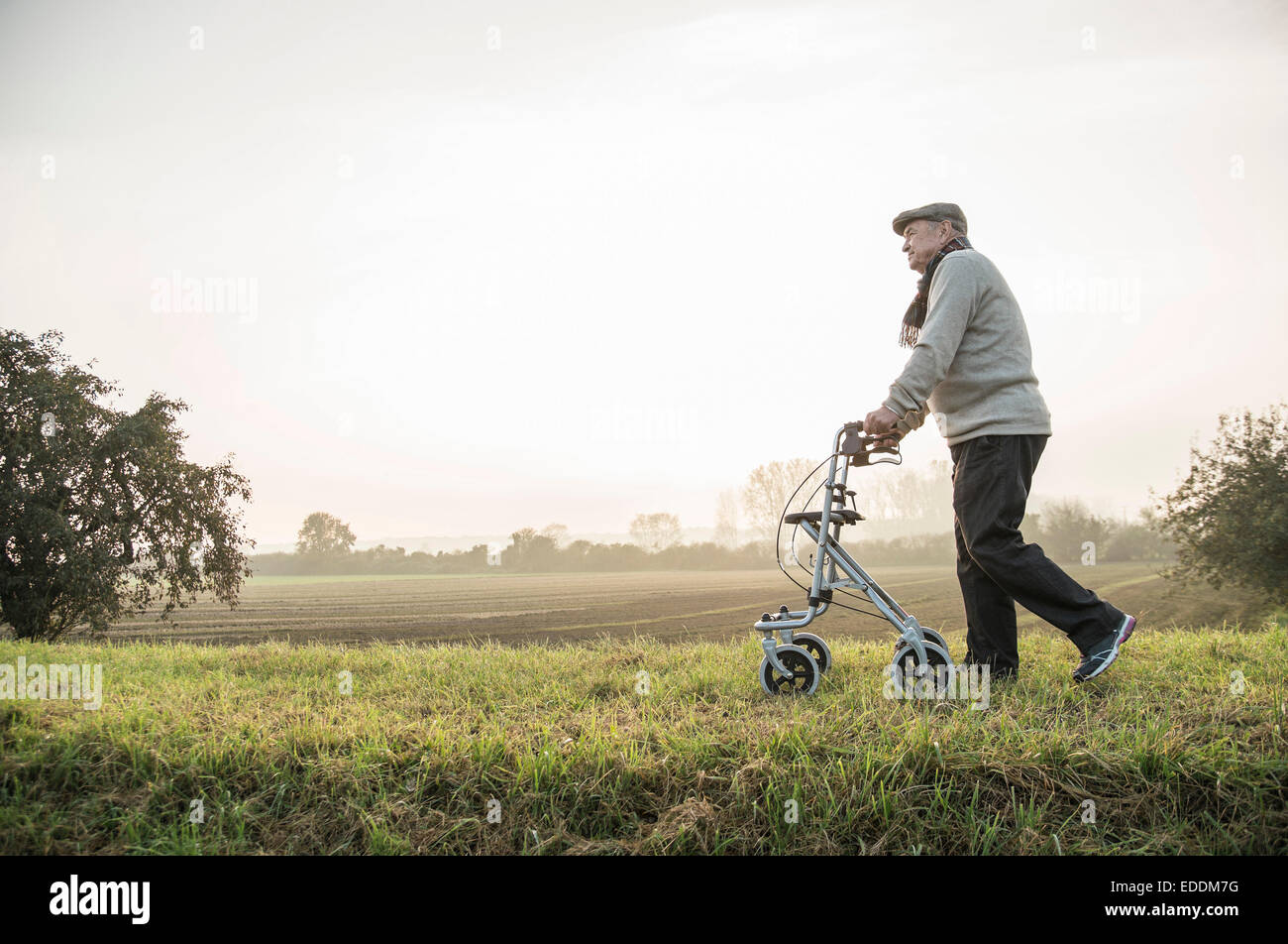 Old man with walker field hi-res stock photography and images - Alamy