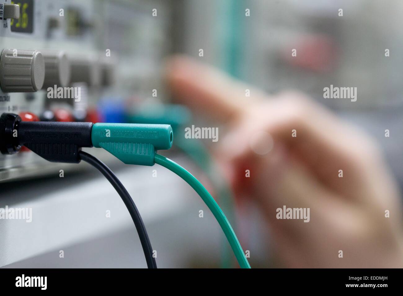 Close up hands working on wires hi-res stock photography and images - Alamy