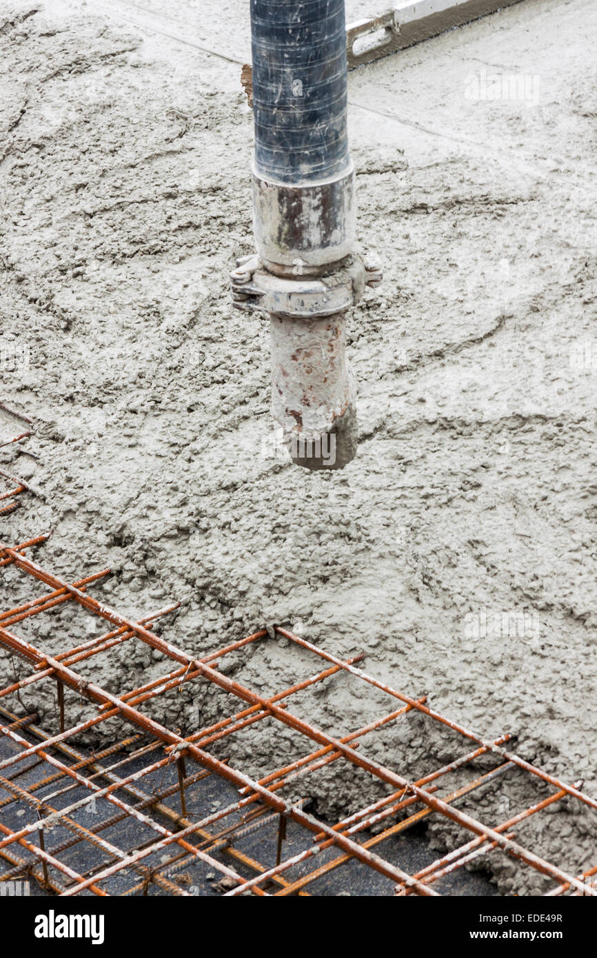 Pipe with concrete - construction site Stock Photo - Alamy