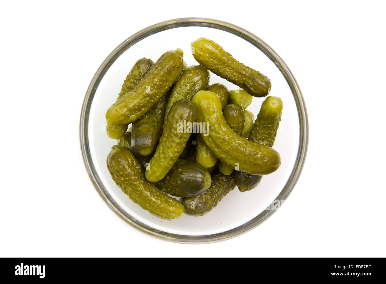 pickles on bowl on white background seen from above Stock Photo - Alamy