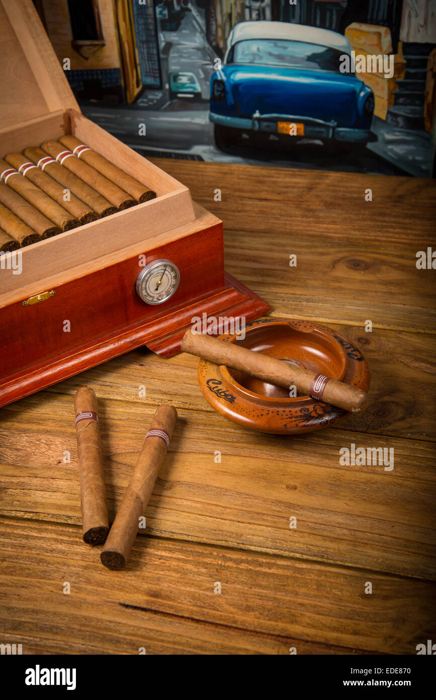 Cuban handmade cigars on table with Rum and Cuba related items Stock ...