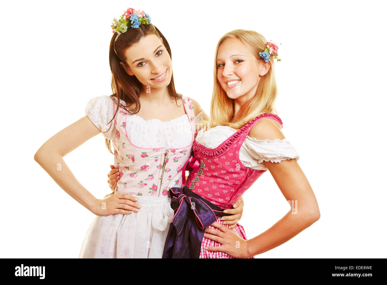 Two happy women in pink dirndl dress in Bavaria at Oktoberfest Stock ...