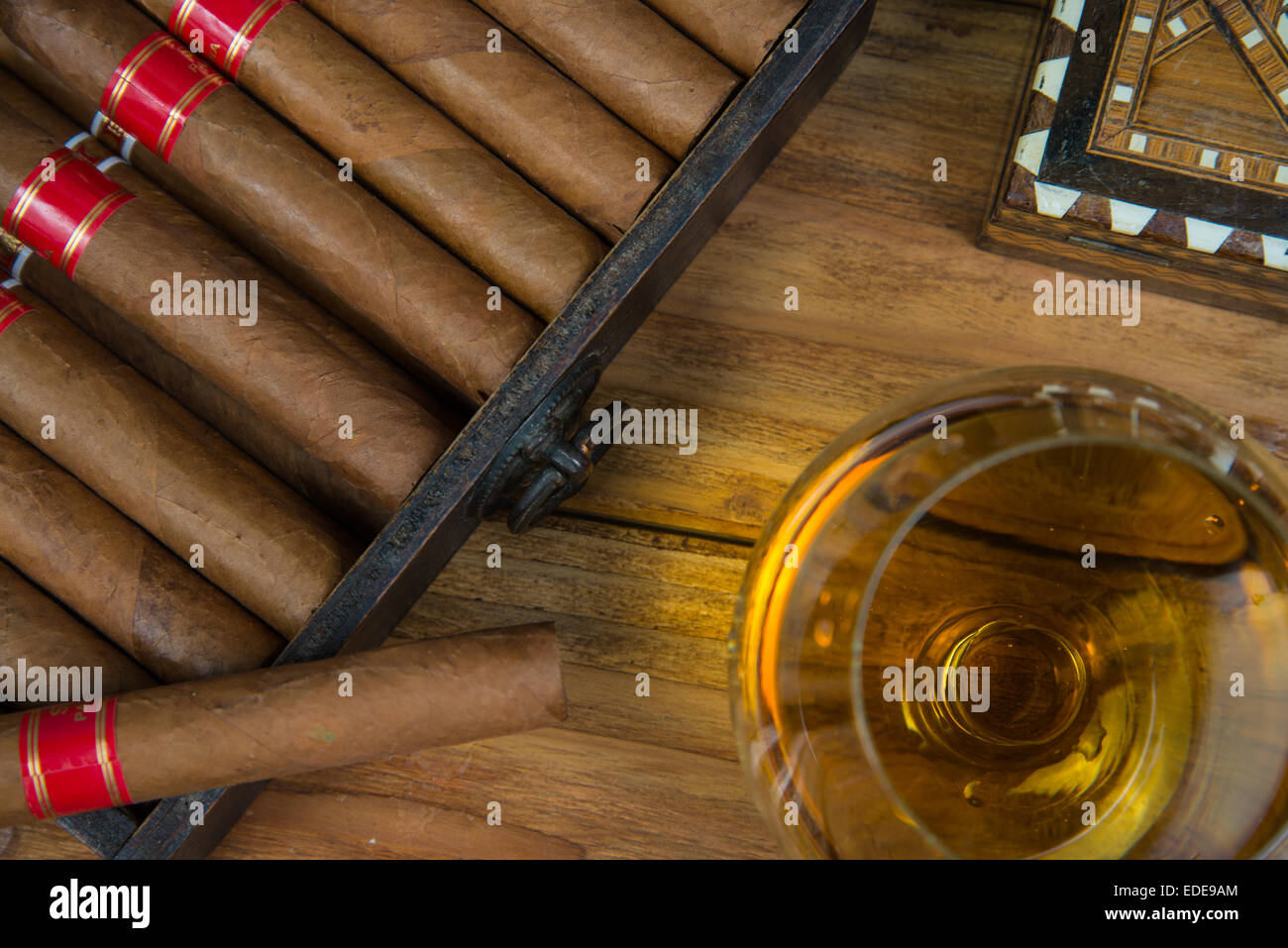 Cuban handmade cigars on table with Rum and Cuba related items Stock ...