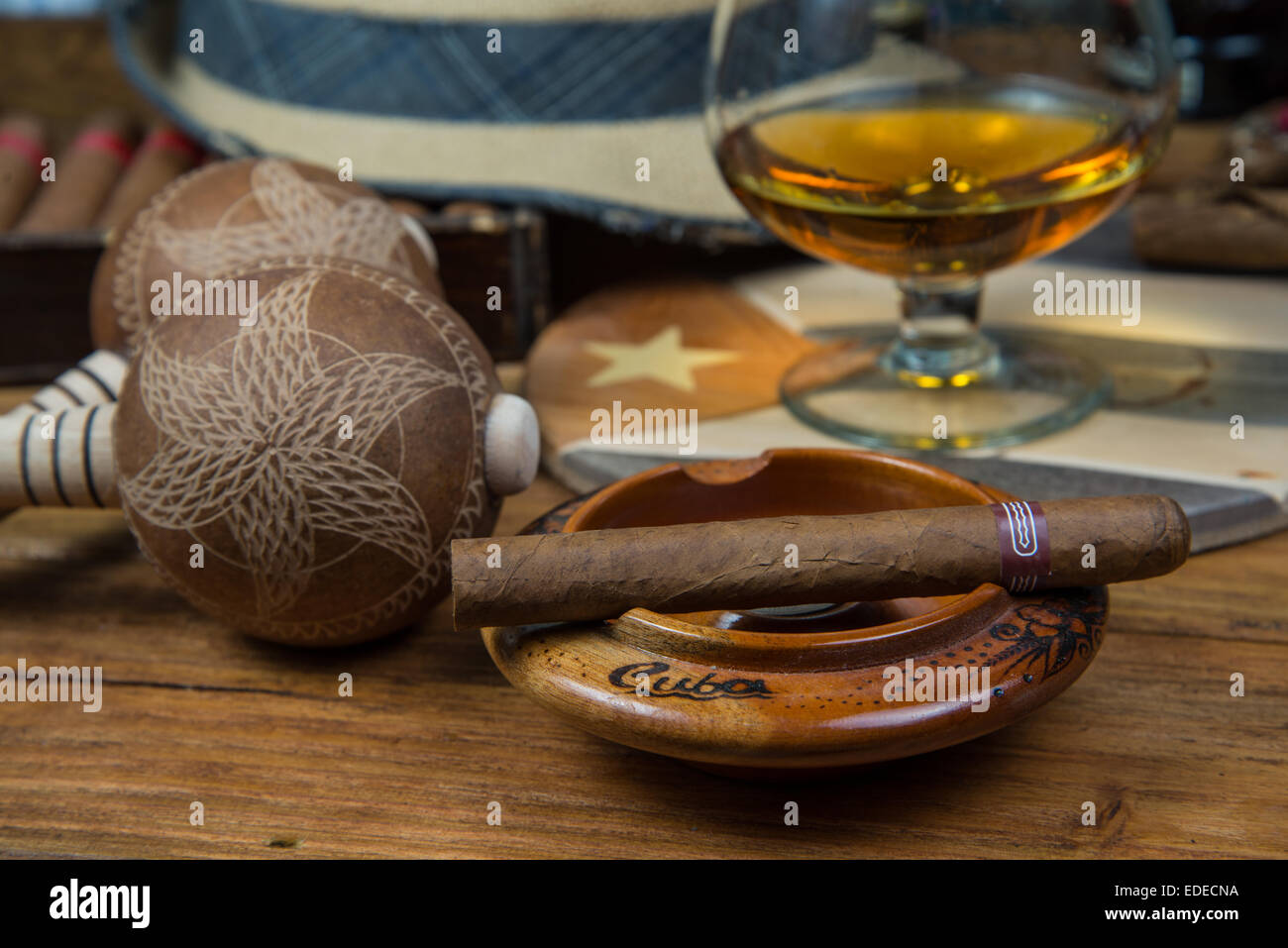 Cuban handmade cigars on table with Rum and Cuba related items Stock ...