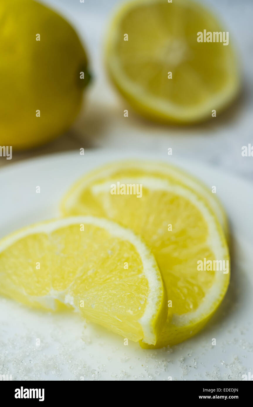 Lemon and lemon slice close Stock Photo - Alamy