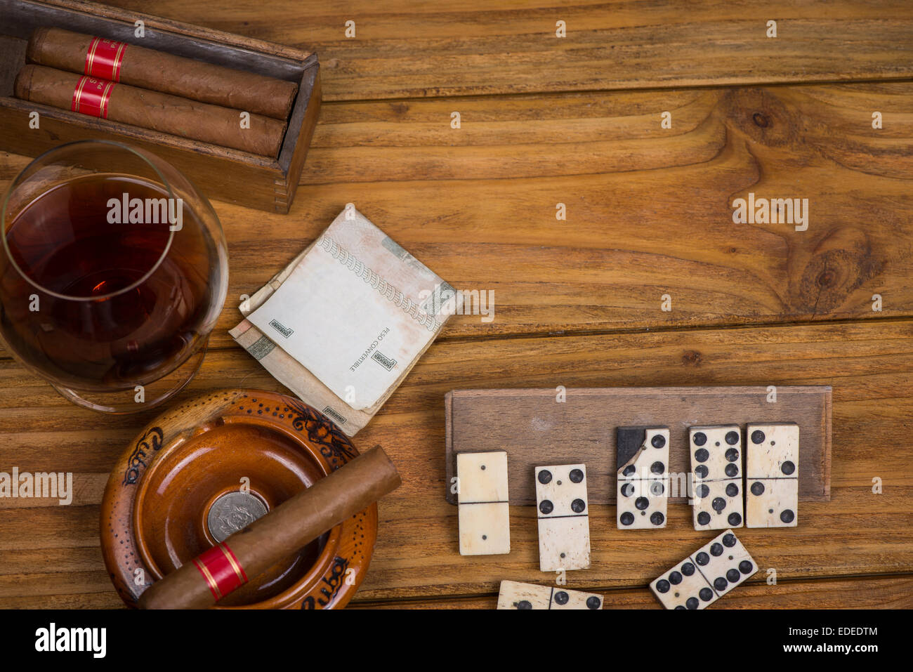 Cuban handmade cigars on table with Rum and Cuba related items Stock ...