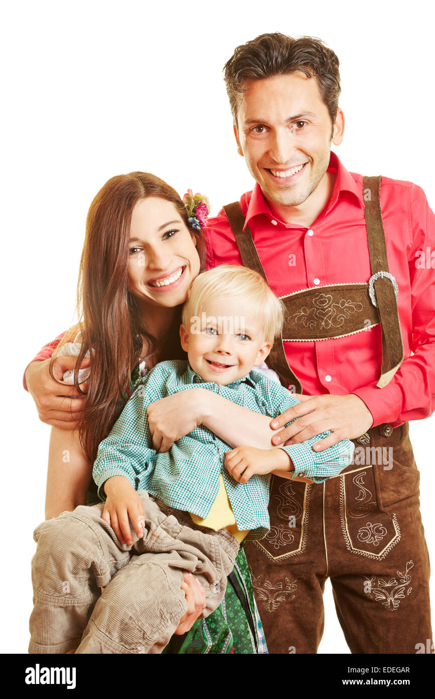 Happy family in bavaria smiling with child Stock Photo - Alamy