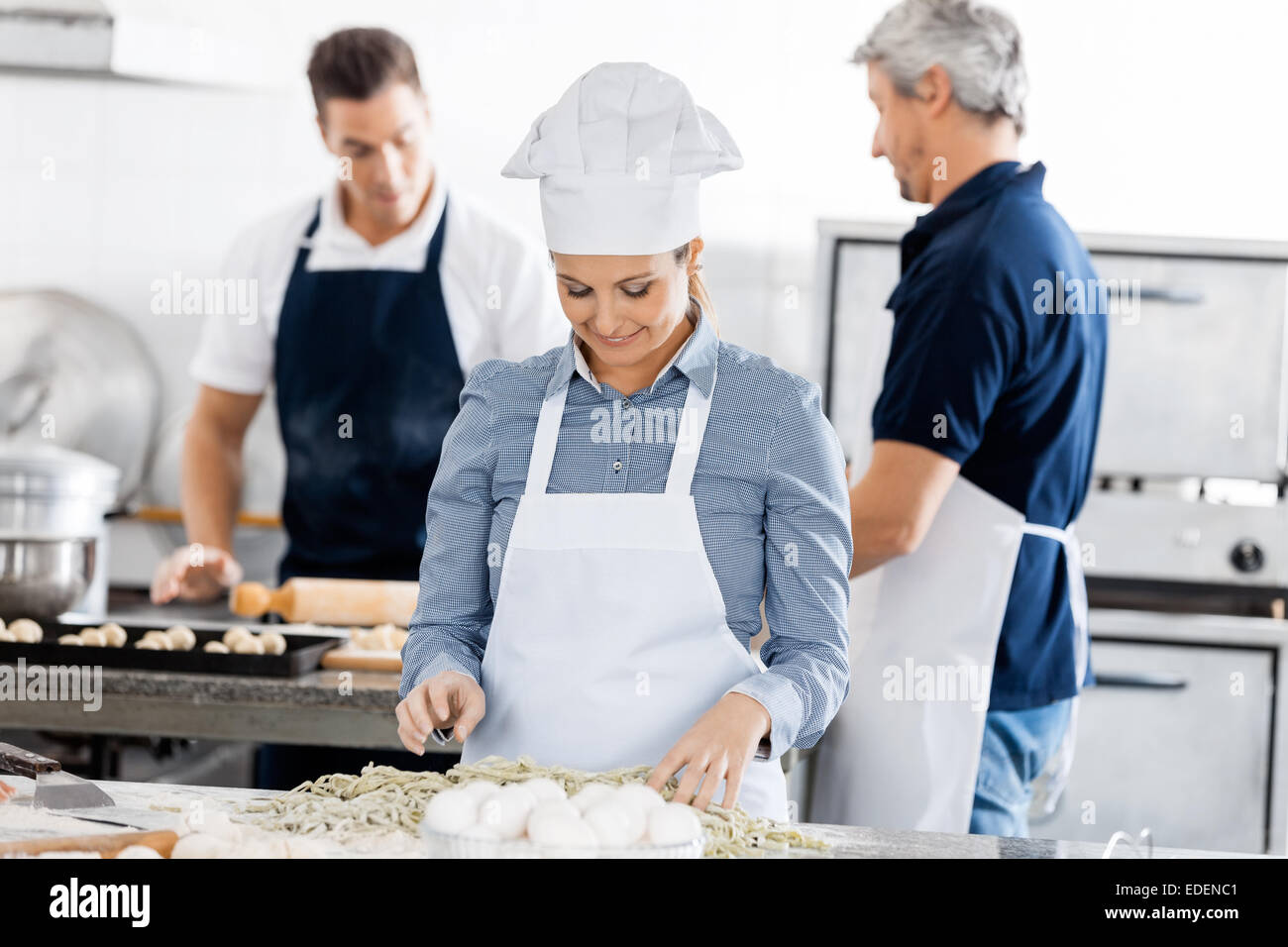 Chefs in commercial kitchen hi-res stock photography and images - Alamy