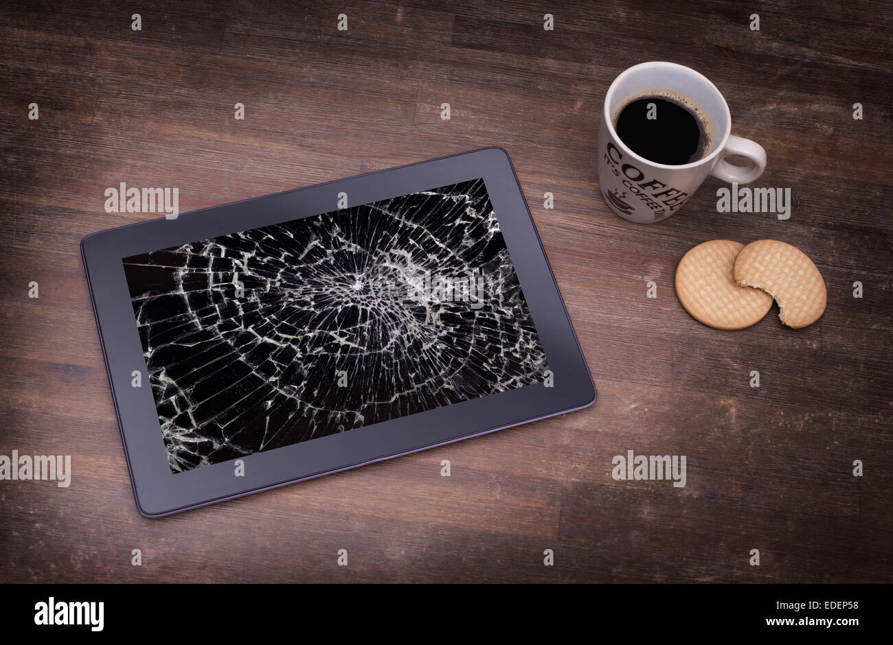 Tablet computer with broken glass, screen destroyed Stock Photo - Alamy