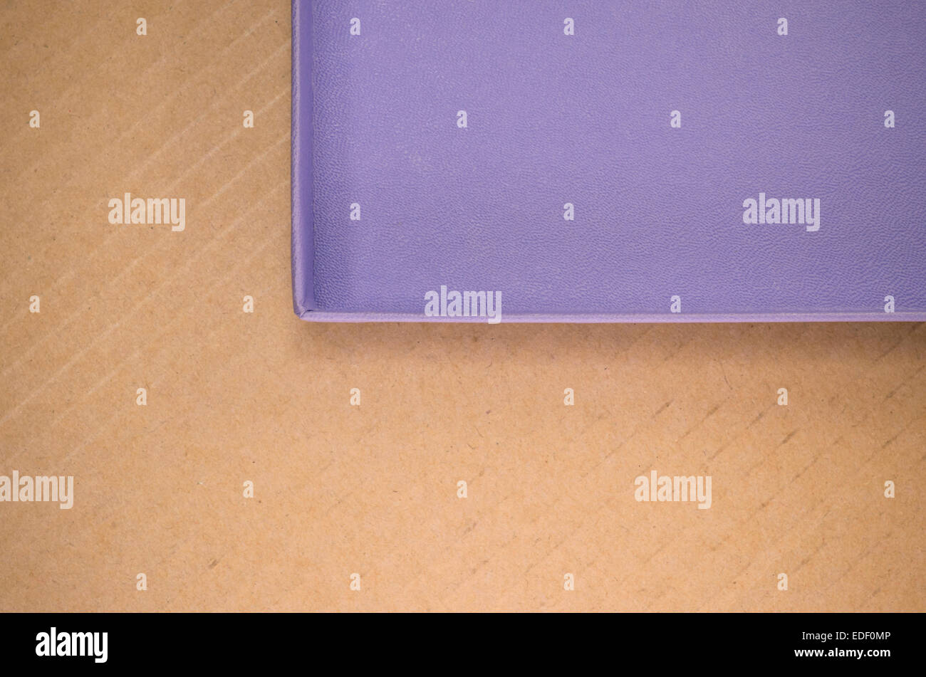 violet box on a paperboard background viewed from above Stock Photo - Alamy