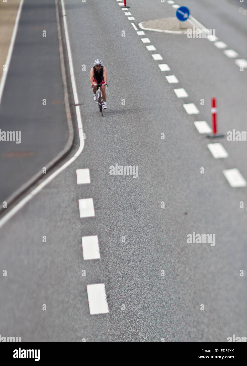 Man on bike during an iron man competition in Denmark Stock Photo - Alamy