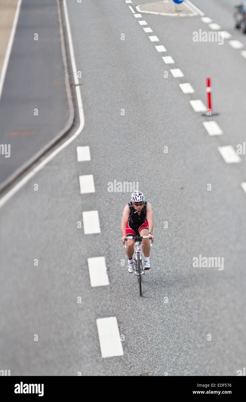Man on bike during an iron man competition in Denmark Stock Photo - Alamy