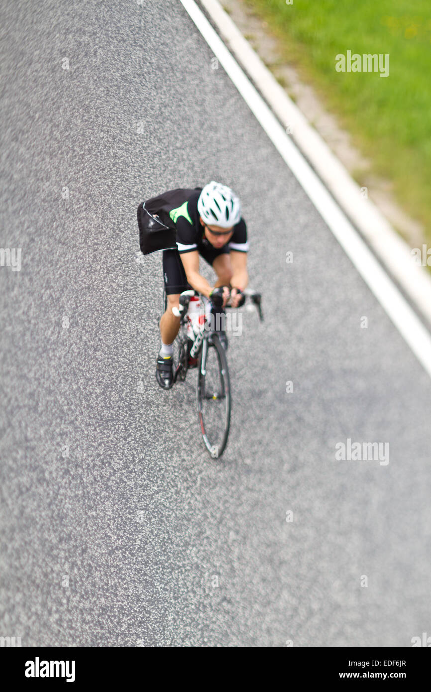 Man on bike during an iron man competition in Denmark Stock Photo - Alamy