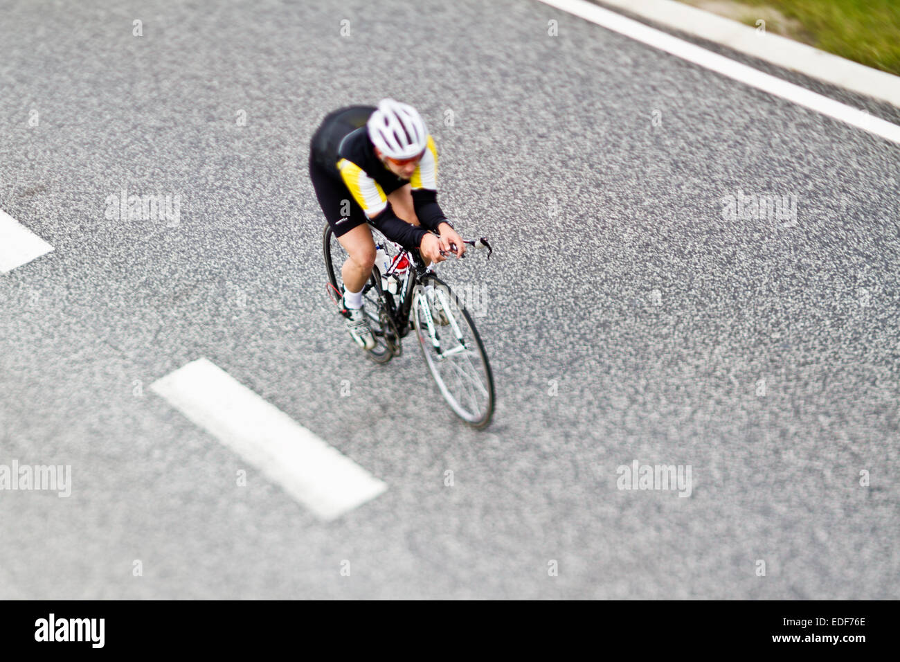 Man on bike during an iron man competition in Denmark Stock Photo - Alamy
