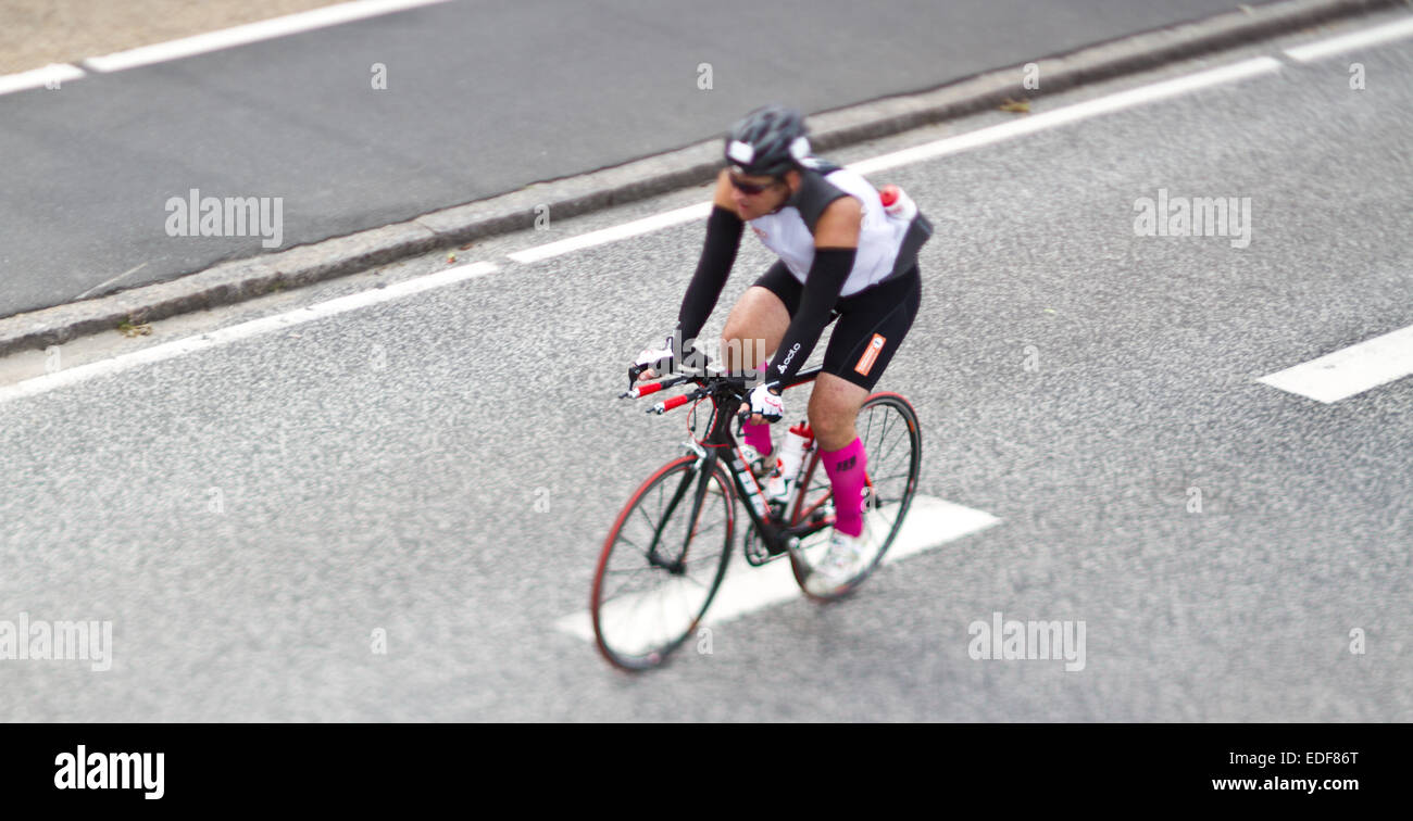Man on bike during an iron man competition in Denmark Stock Photo - Alamy