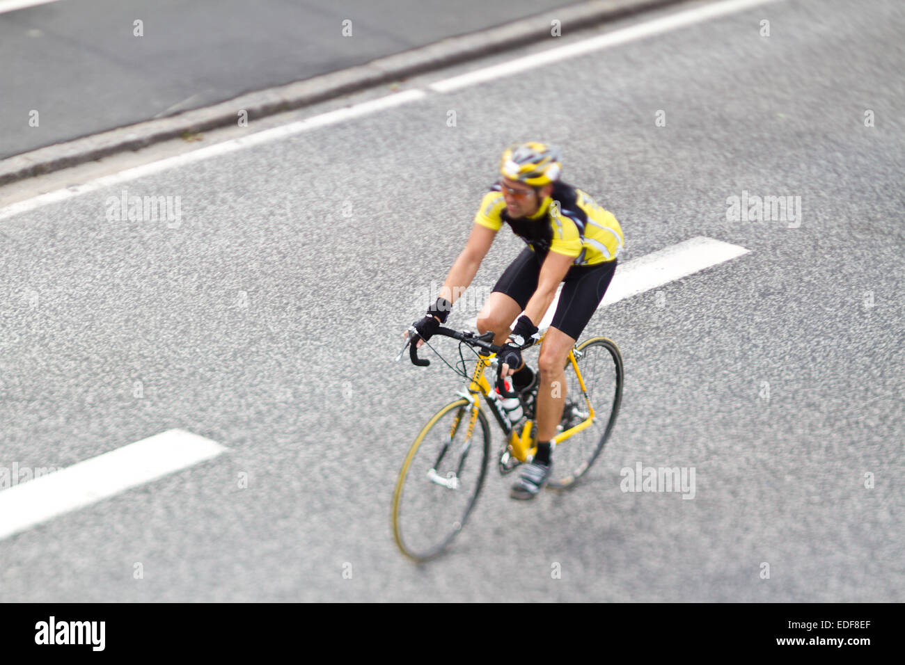 Man on bike during an iron man competition in Denmark Stock Photo - Alamy