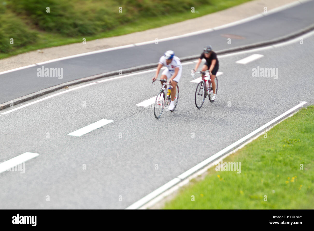 Man on bike during an iron man competition in Denmark Stock Photo - Alamy
