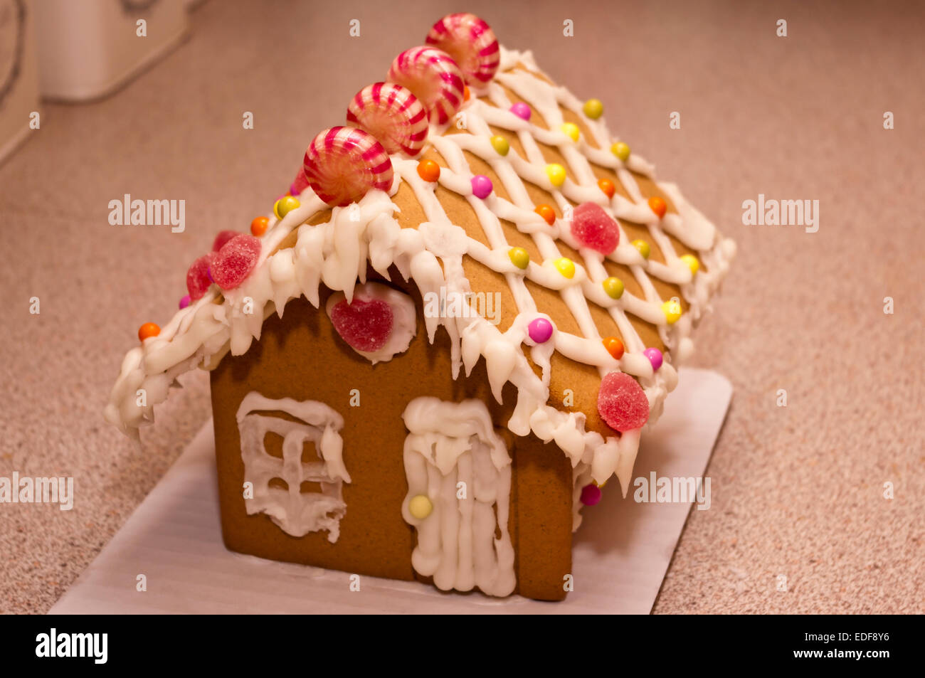 Home Baking Gingerbread House Decorated with White Icing and Sweets ...