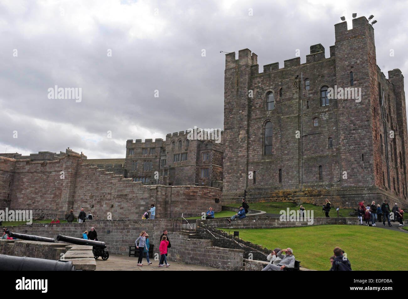 Visitors around the inner keep, Bamburgh Castle Stock Photo - Alamy