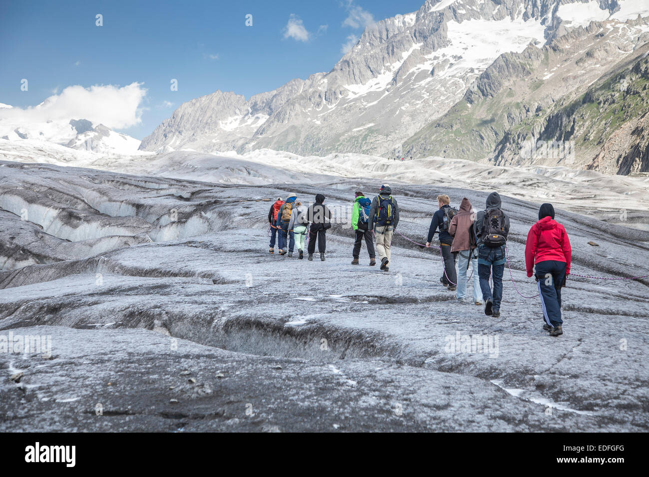 people walking on a glacier Stock Photo - Alamy