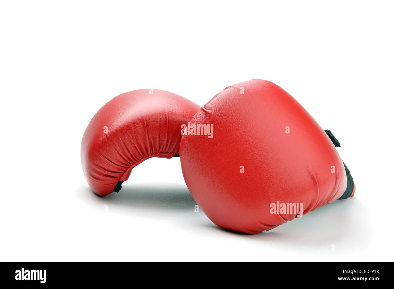 red leather boxing gloves for punching bag or for karate on white ...