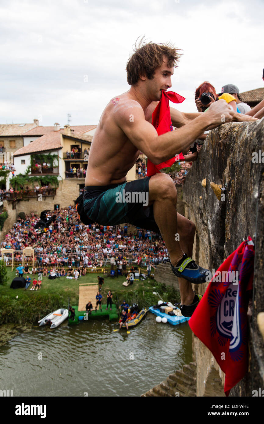 A man climbing a bridge Stock Photo - Alamy