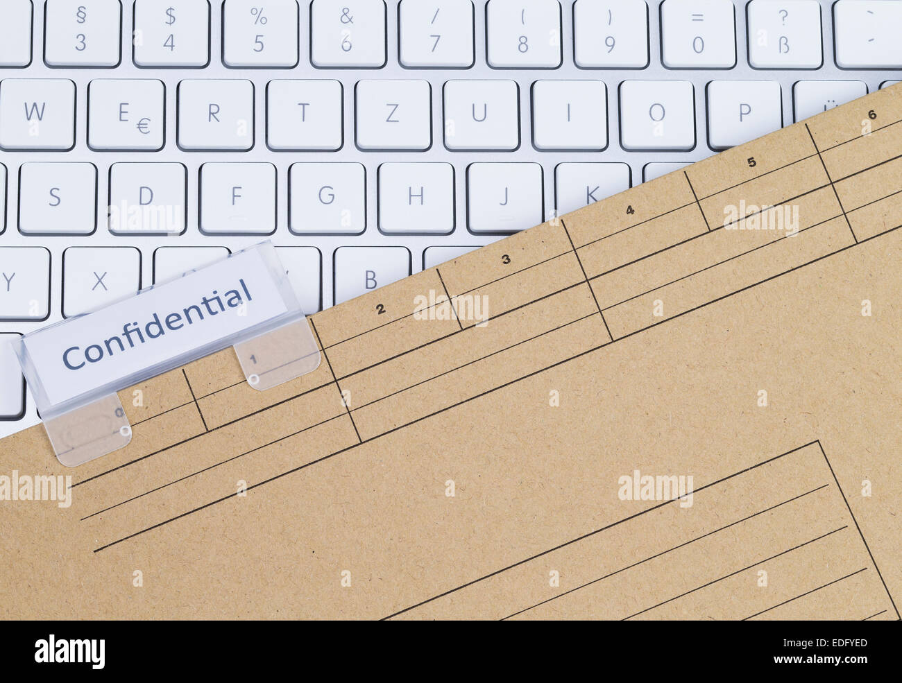 Keyboard and folder confidential Stock Photo - Alamy