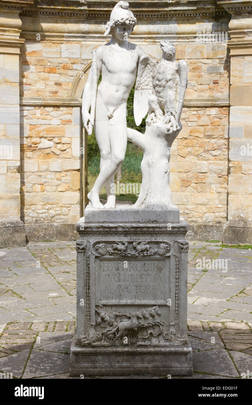 Roman statue of young boy with eagle in the garden of Hever Castle ...
