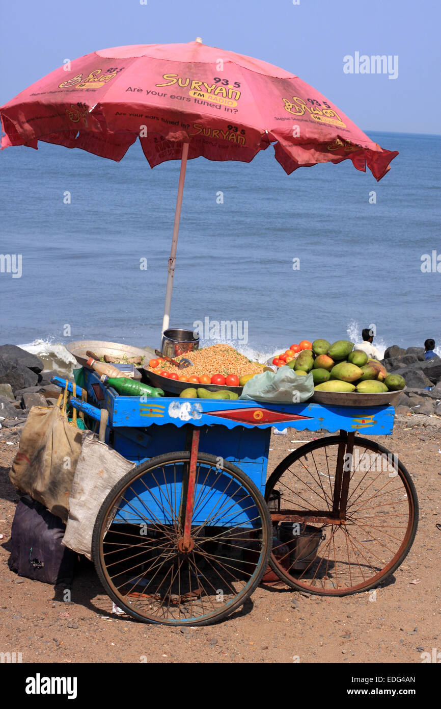 Cart offering mangoes and chaat on the beach at Pondicherry on a hot ...