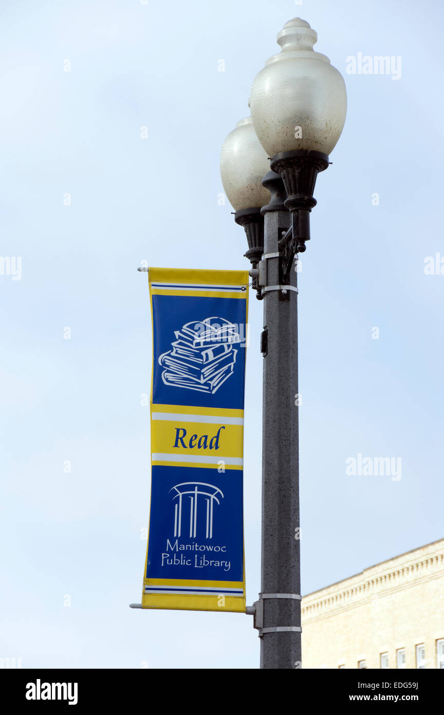 Street banner promoting reading at Manitowoc, Wisconsin Public Library ...