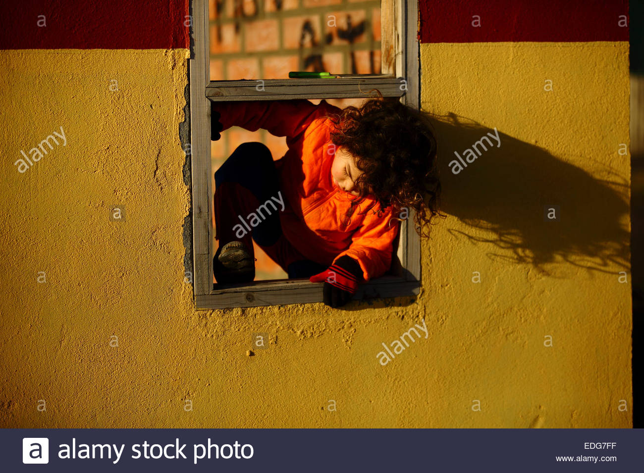 Climbing Through Window Stock Photos & Climbing Through Window Stock ...